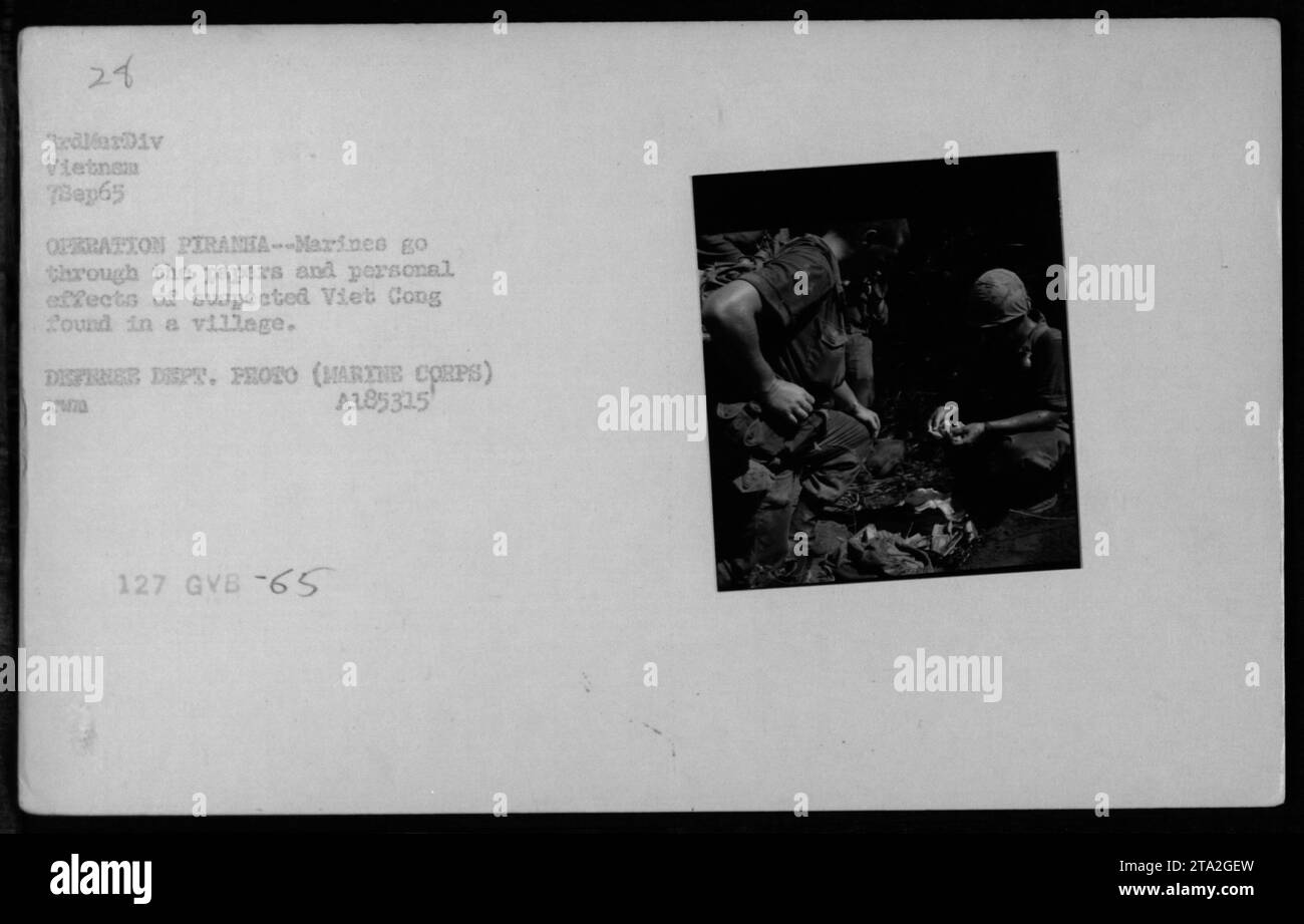 Soldiers from the 3rd Marine Division search personal belongings and ...