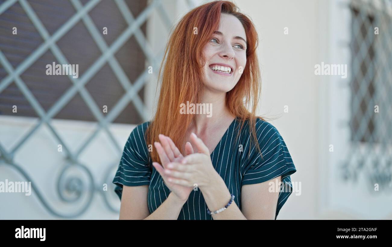 Woman clapping on outdoor street hi-res stock photography and images ...