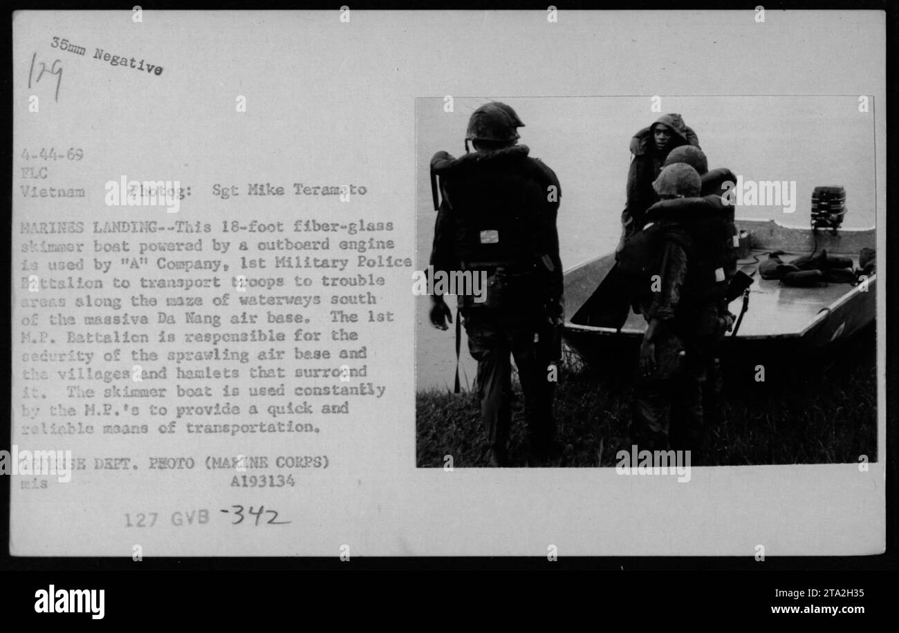 "A" Company, 1st Military Police Battalion uses an 18-foot fiberglass ...