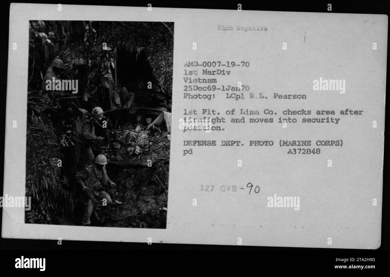 American Marines from the 1st Marine Division inspect the area after a ...