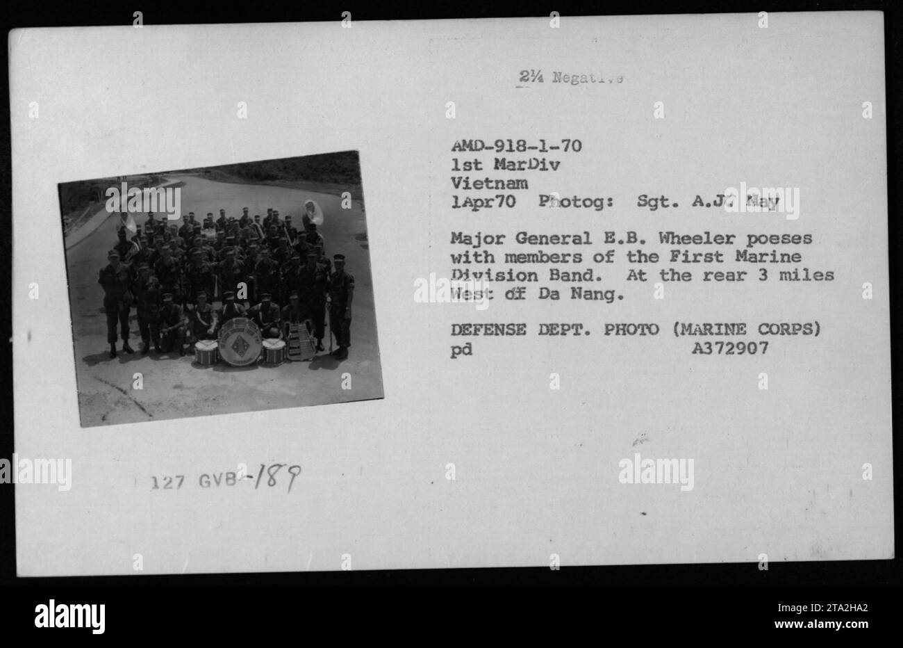 Major General E.B. Wheeler stands with members of the First Marine ...