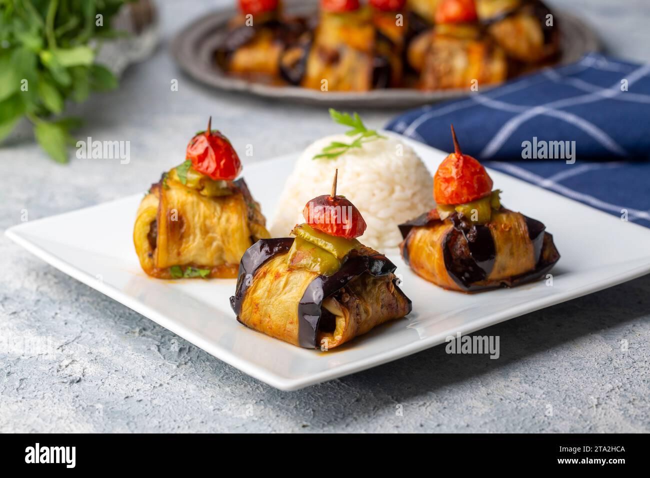 Traditional delicious Turkish food; Kofte kebab wrapped in eggplant ...
