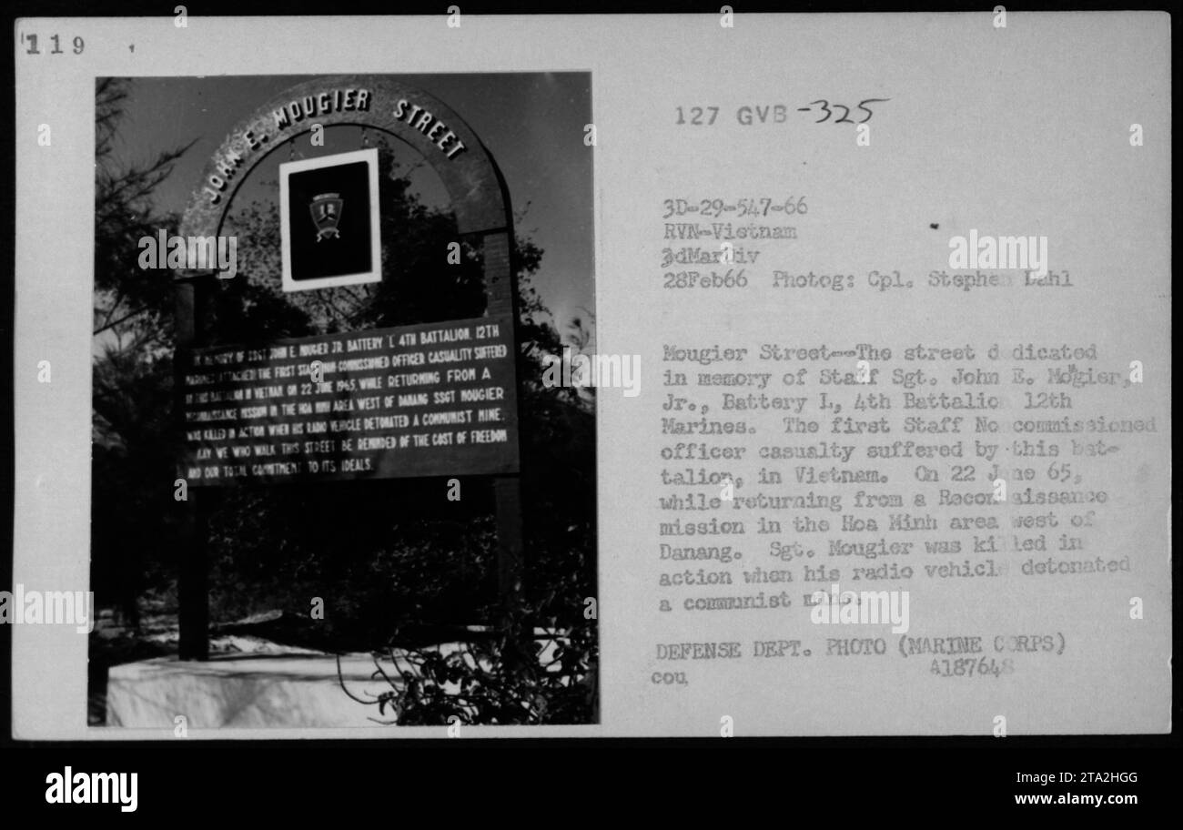 On February 28, 1966, a sign on Mougier Street in Vietnam honors Staff ...