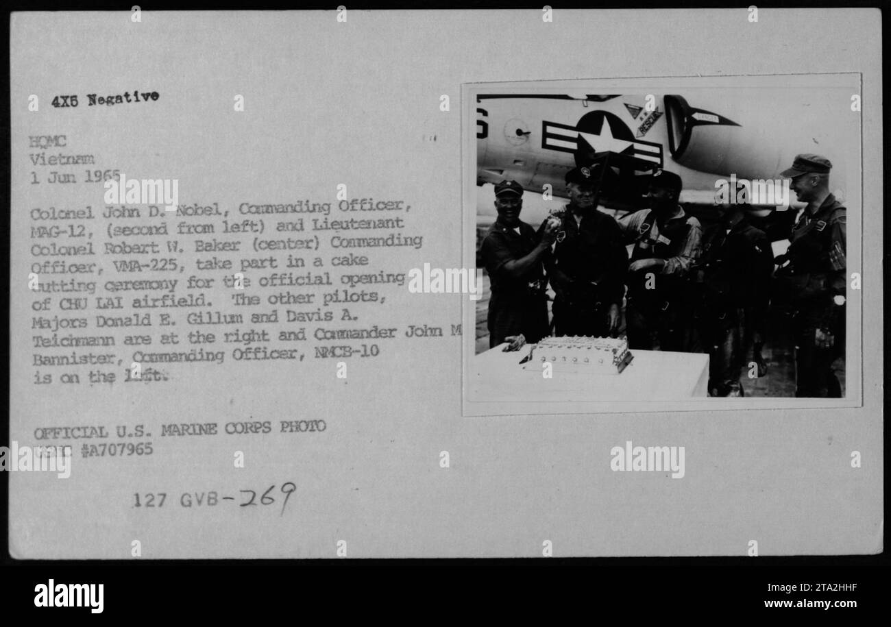 Colonel John D. Nobel and Lieutenant Colonel Robert W. Baker attend a ...