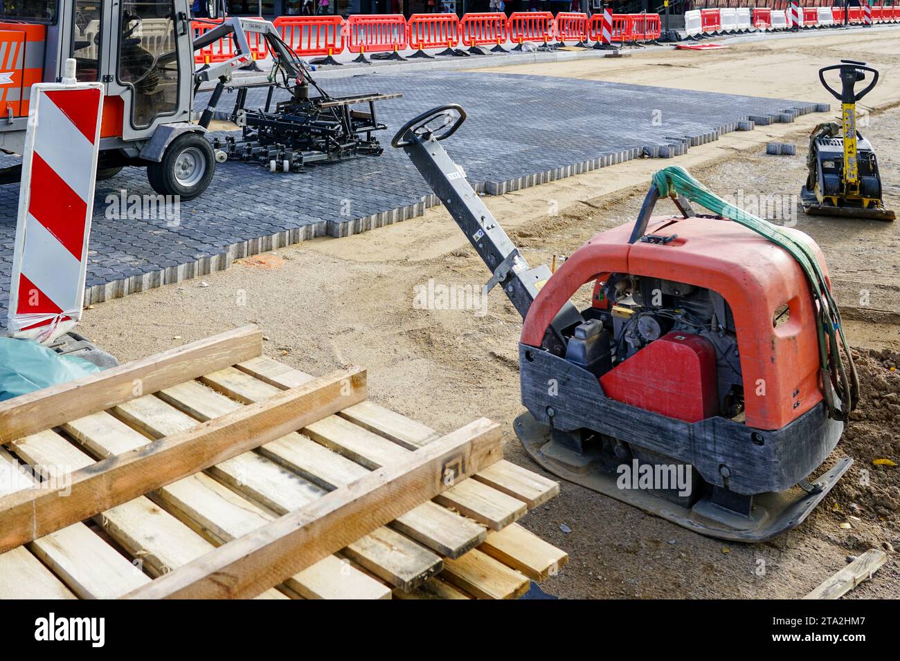 Repaved place, mobile plate compactors, block laying machine, warning ...