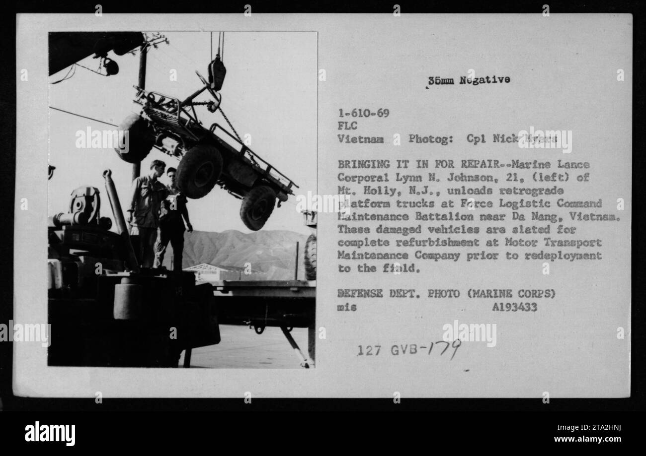 Marine Lance Corporal Lynn N. Johnson unloads damaged retrograde ...