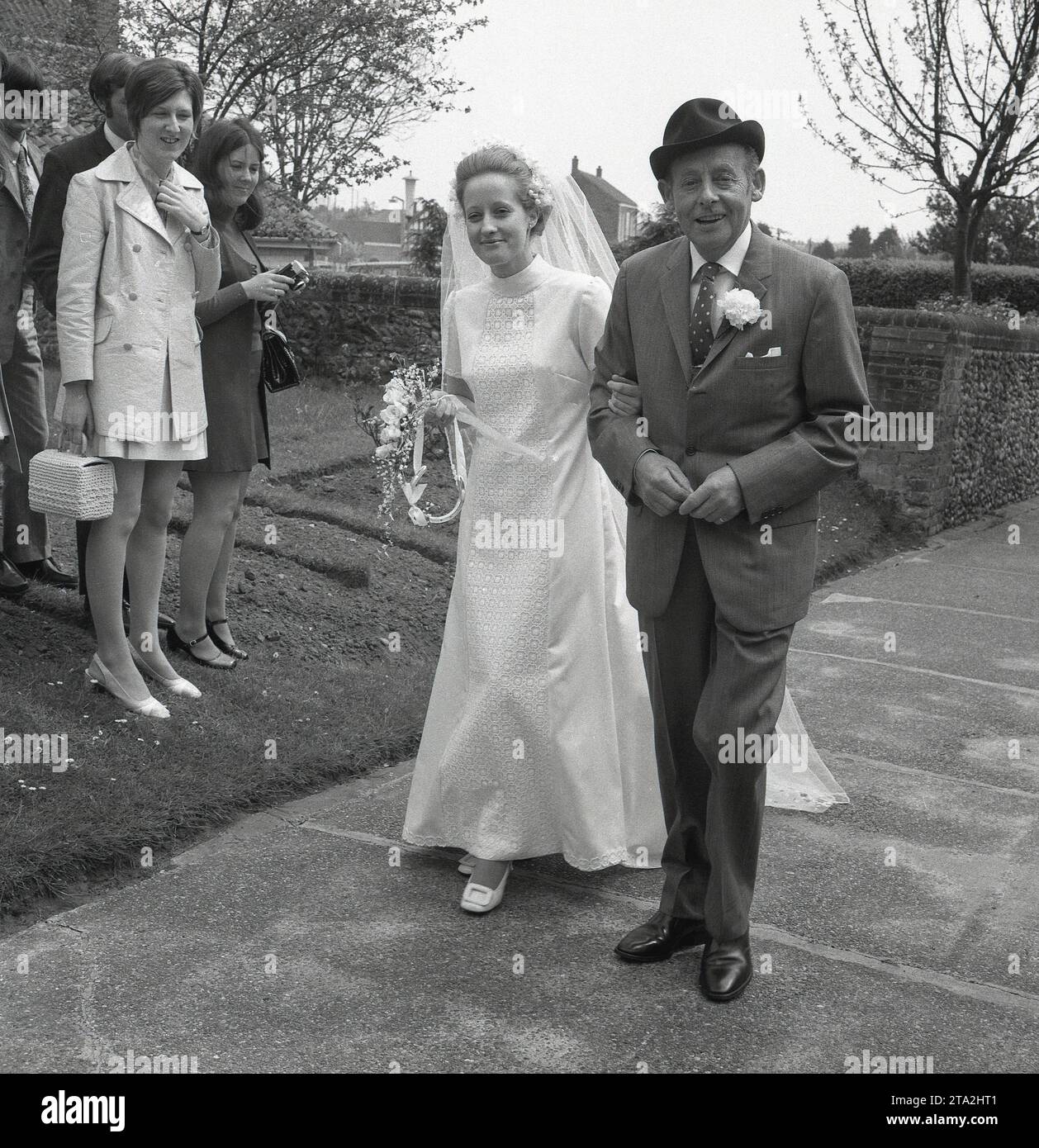 1960s, historical, wedding, a proud father, looking dapper in a suit ...