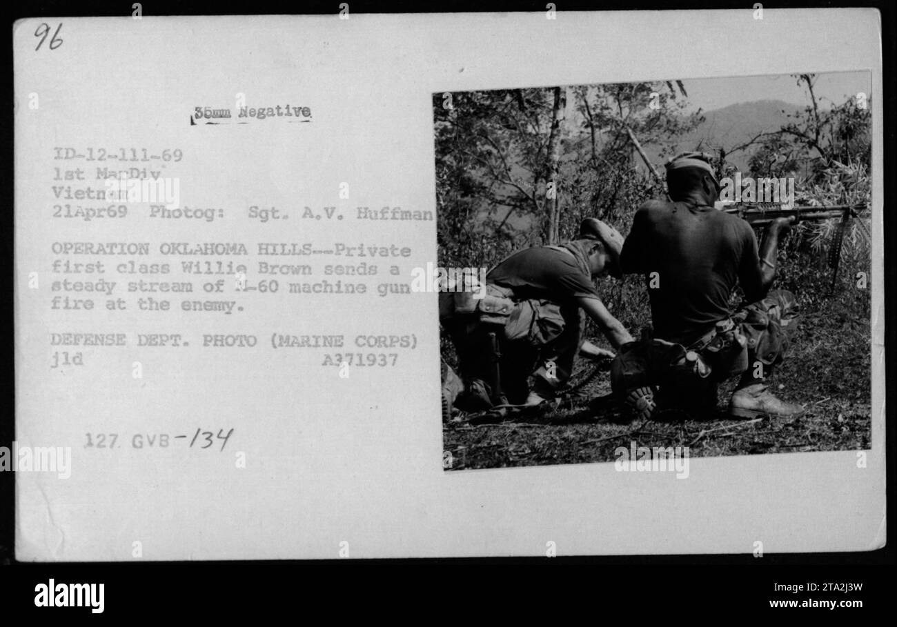 A U.S. Marine, Private first class Willie Brown, participates in ...