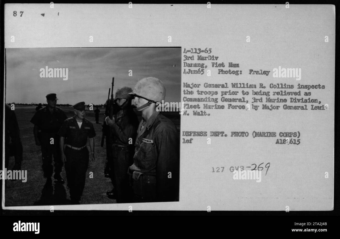 Major General William R. Collins inspects the troops before being ...