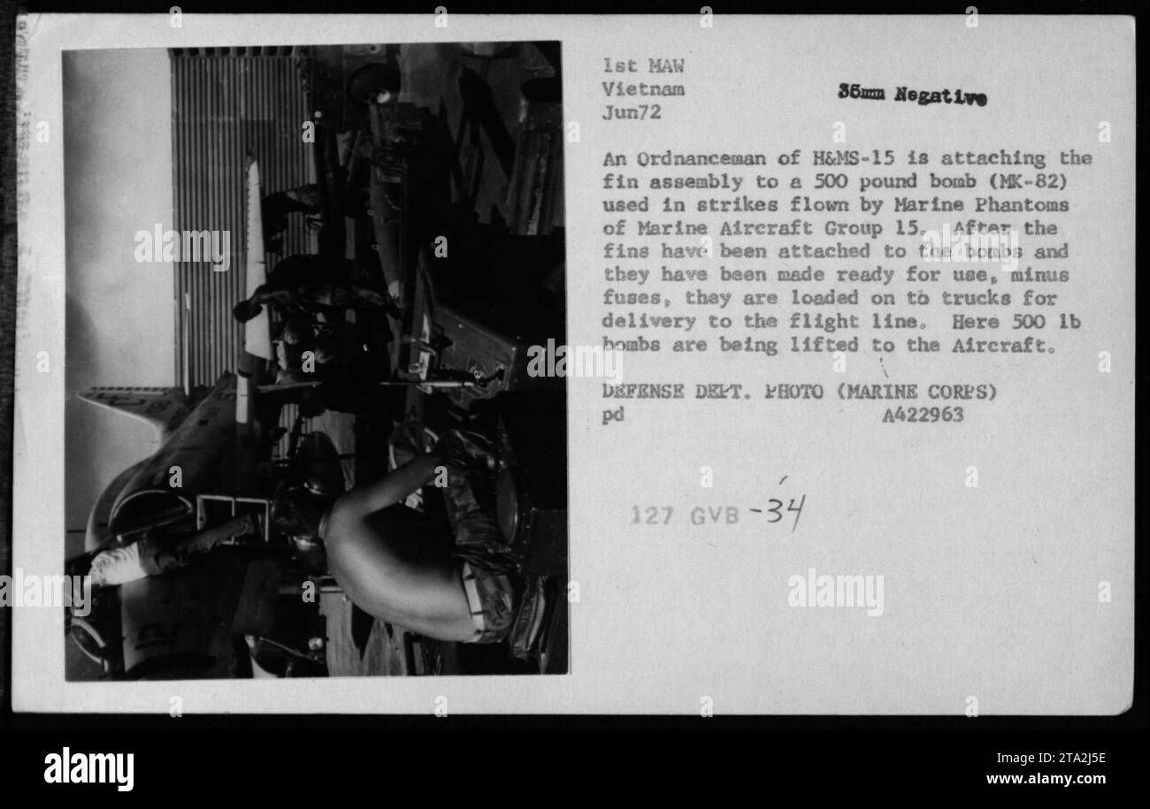 An ordnanceman from H&MS-15 attaches the fin assembly to a 500-pound MK ...