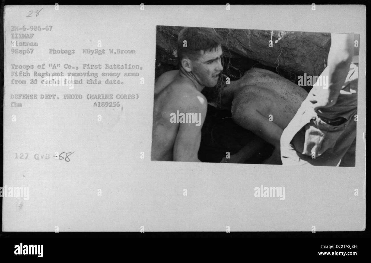 Troops from A Company, First Battalion, Fifth Regiment remove enemy ...