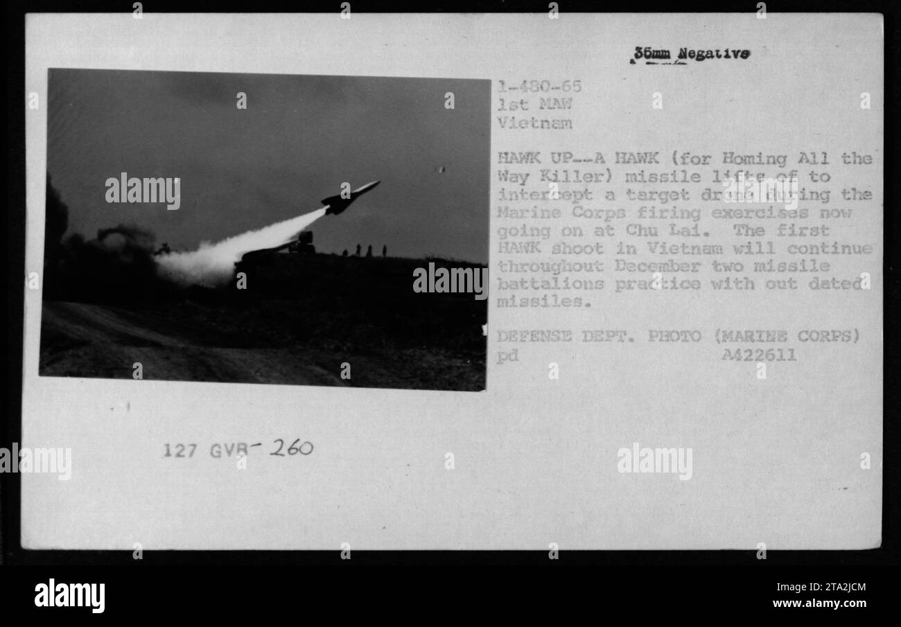 A US Marine fires a HAWK missile to intercept a target drone during ...