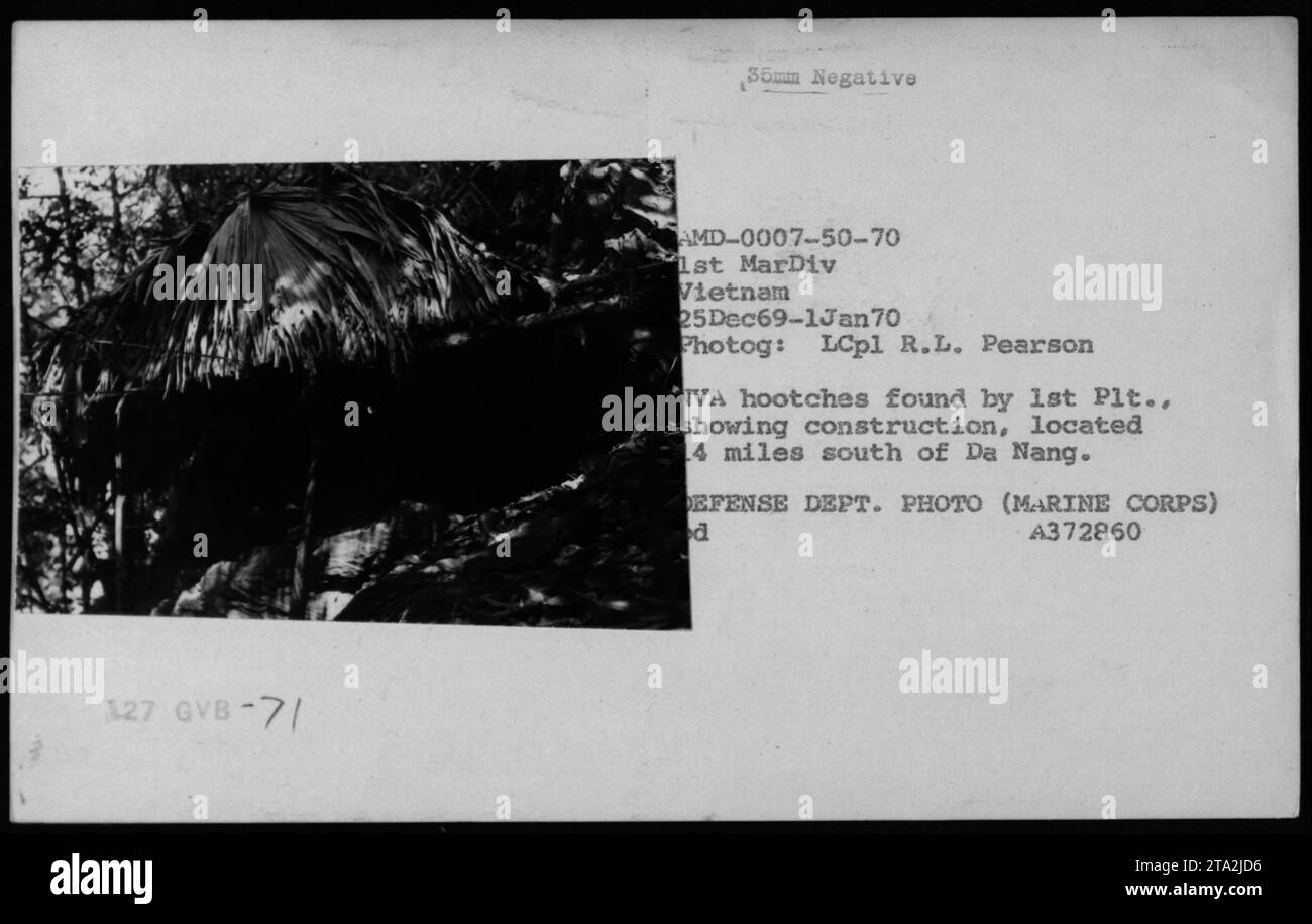 This official Defense Department photo taken by LCpl R.L. Pearson on ...