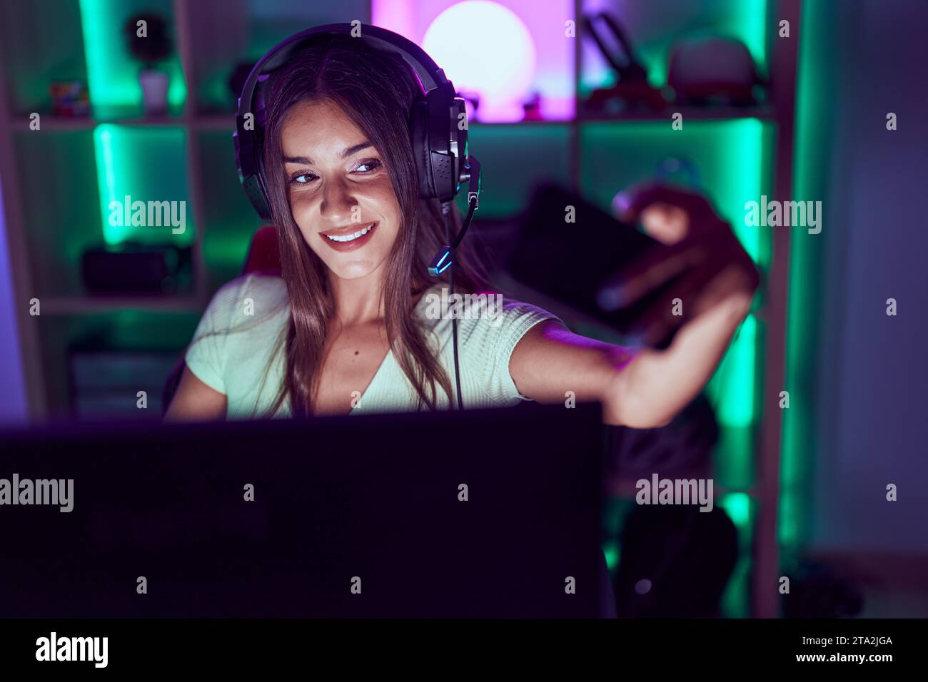 Young beautiful hispanic woman streamer smiling confident make selfie ...