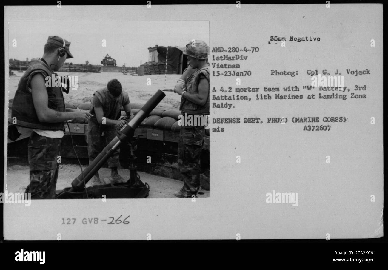 A 4.2 mortar team from "W" Battery, 3rd Battalion, 11th Marines ...