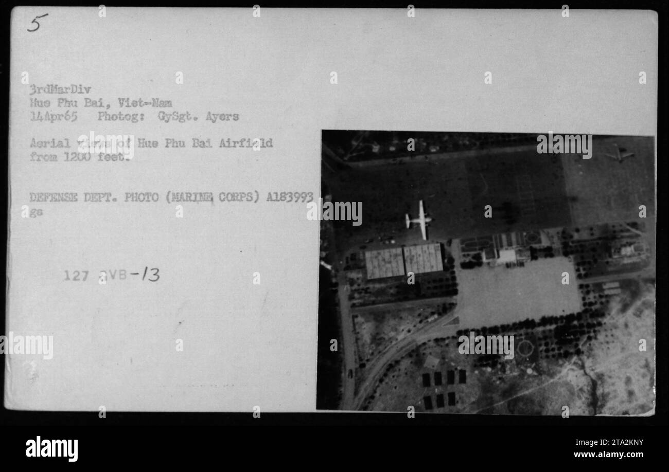 On April 14, 1965, GySgt Ayers captured an aerial view of Hue Phu Bai Airfield, showing military ...