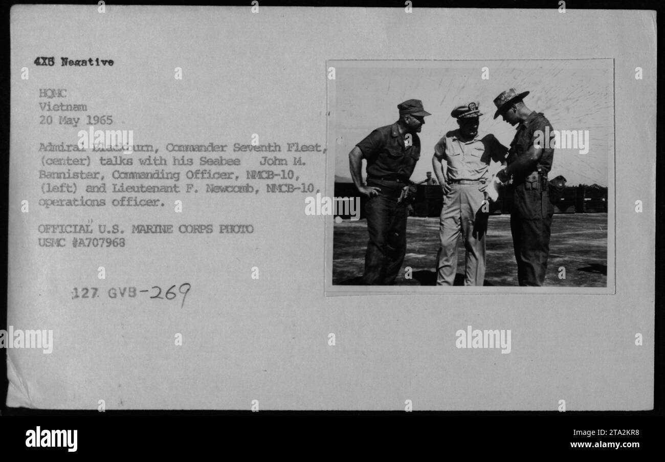 Admiral Blackburn, Commander of the Seventh Fleet, engages in a ...