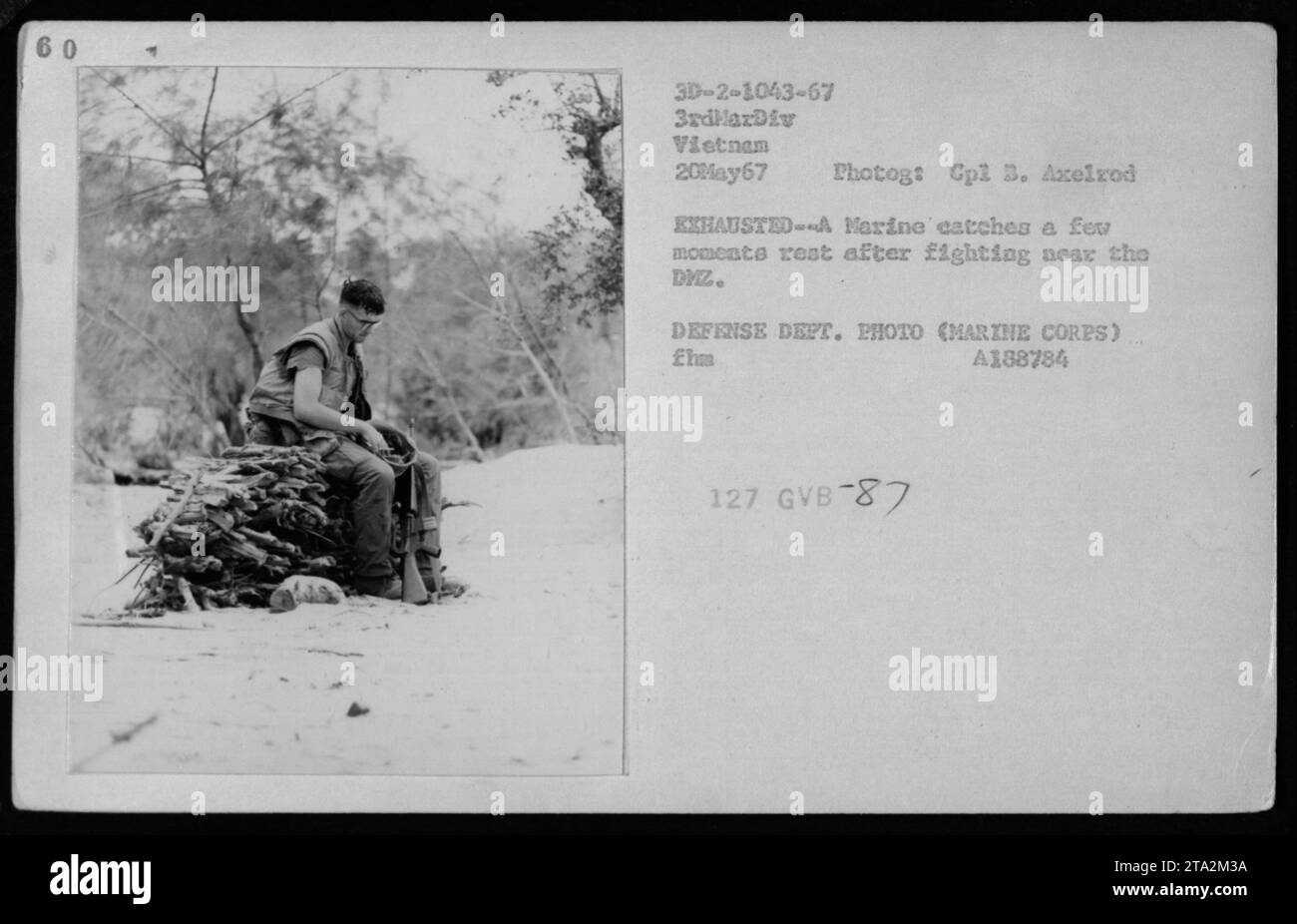 A Marine rests after combat near the DMZ in Vietnam on May 20, 1967 ...