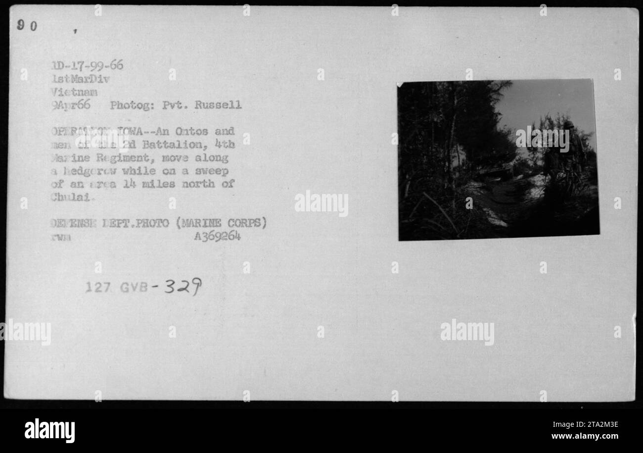 An Ontos vehicle and 2nd Battalion, 4th Marine Regiment troops move ...