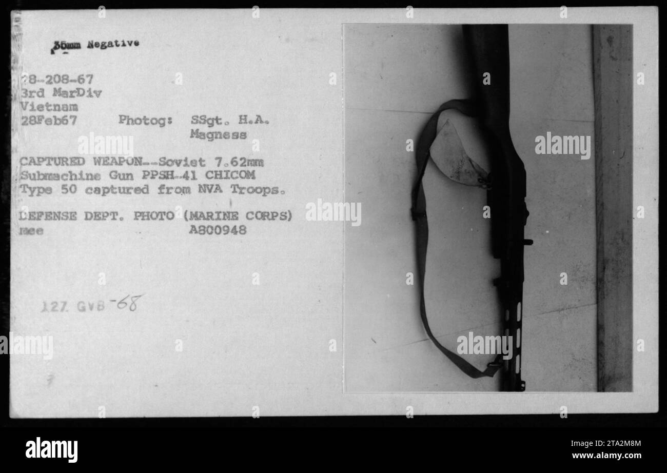 A Vietnam War era photograph shows a captured weapon, specifically a ...