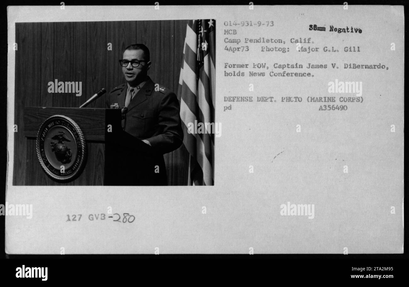 Captain James V. DiBernardo, a former prisoner of war, holding a news ...