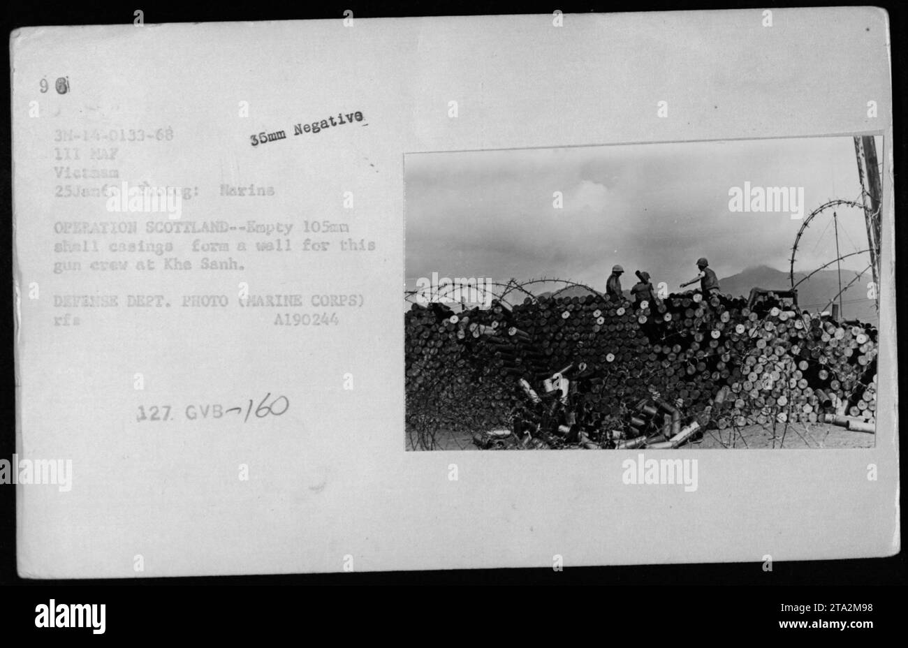 An empty 105mm shell casing acts as a makeshift well for the gun crew ...