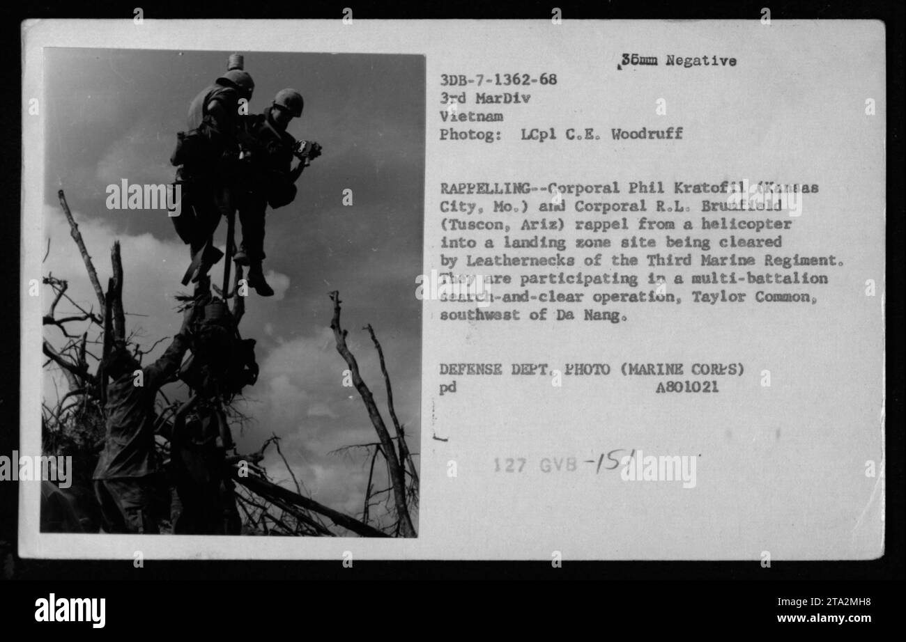 Marines rappelling from a helicopter during Operation Taylor Common ...