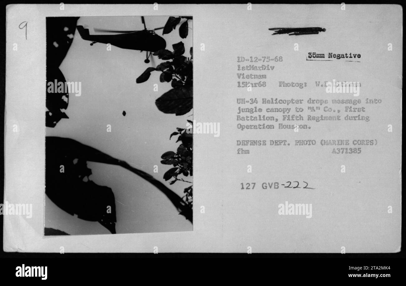 UH-34 helicopters dropping messages into the jungle canopy for "A" Co ...