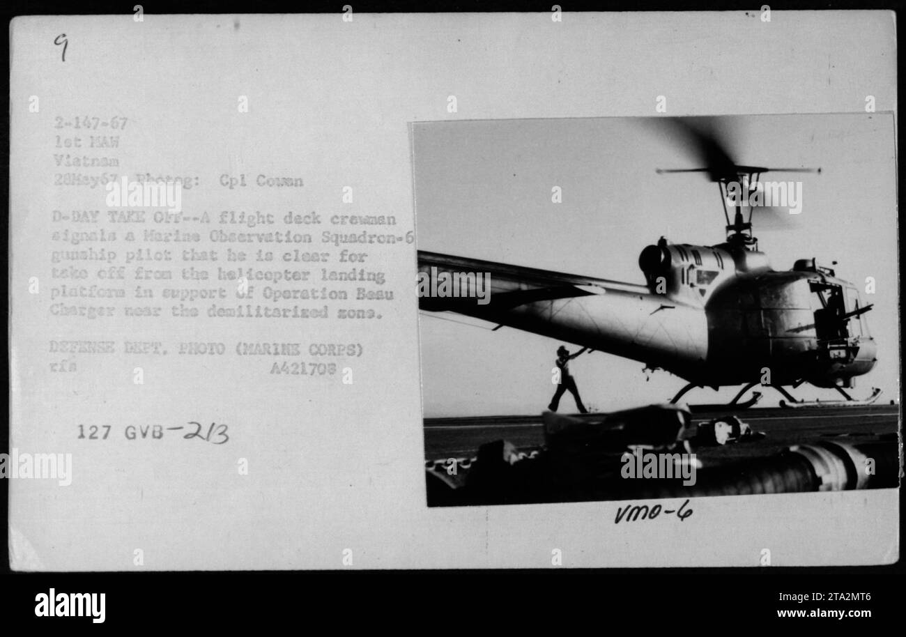 A Marine Observation Squadron-6 gunship takes off from a helicopter ...