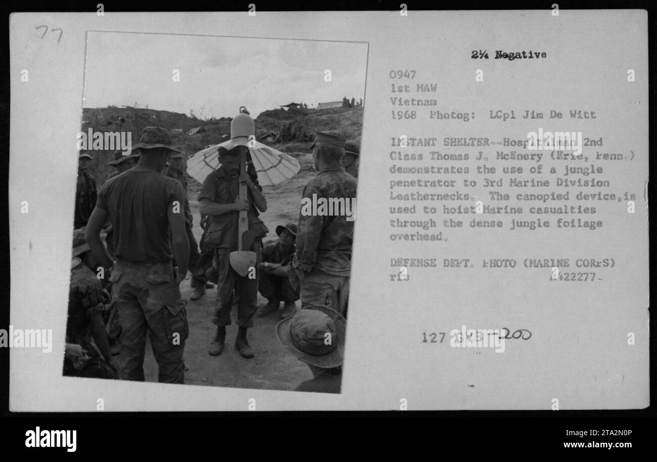 In 1968, Hospitalman 2nd Class Thomas J. McEnery demonstrates a jungle ...