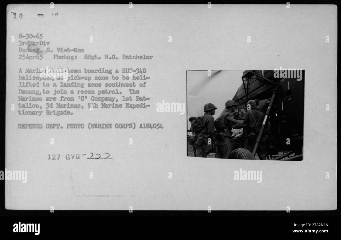 Marine heli-team boarding an UH-34D helicopter, in preparation for a ...