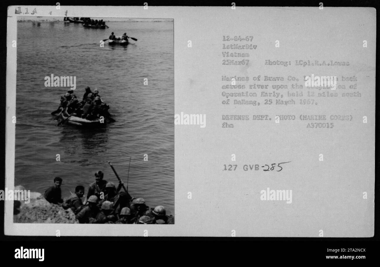Marines from Brave Company, 1/1, move across a river after completing ...