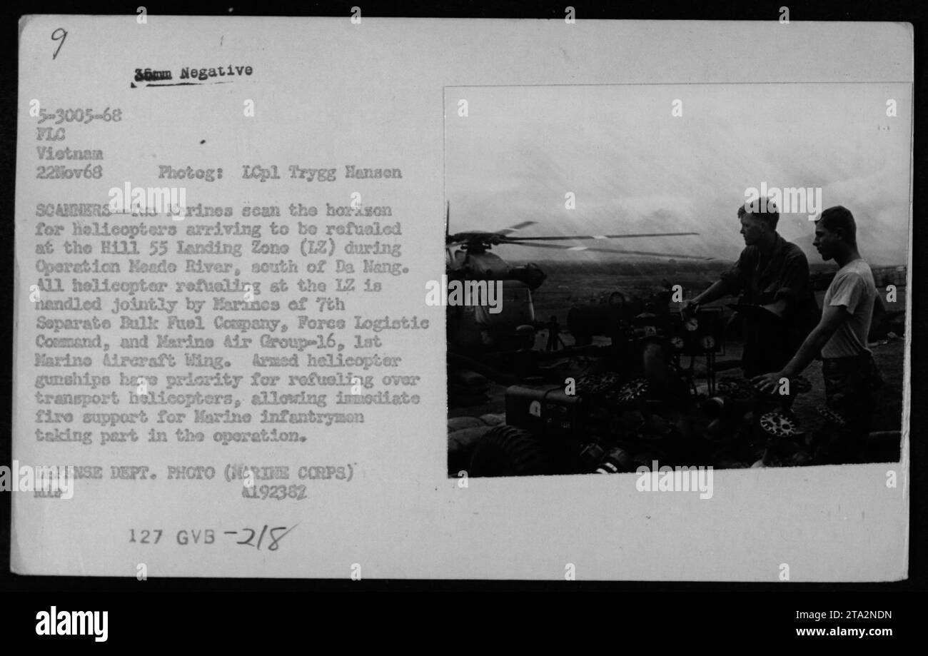 Marines scan the horizon for helicopters at Hill 55 Landing Zone during ...