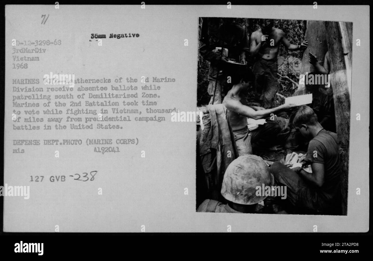 Marines of the 3rd Marine Division receive absentee ballots while ...