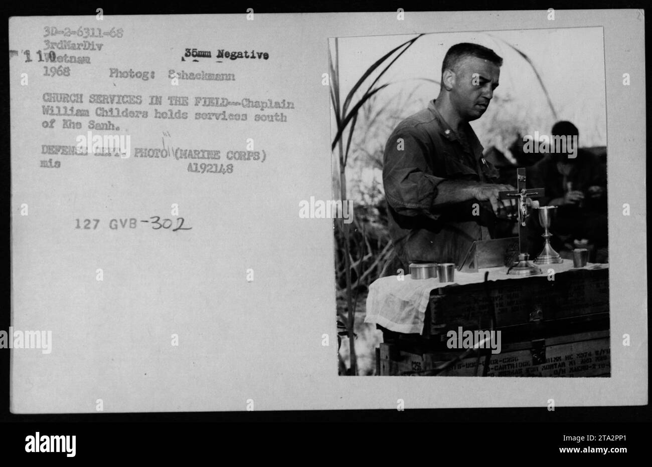 Chaplain William Childers conducts church services in the field south ...