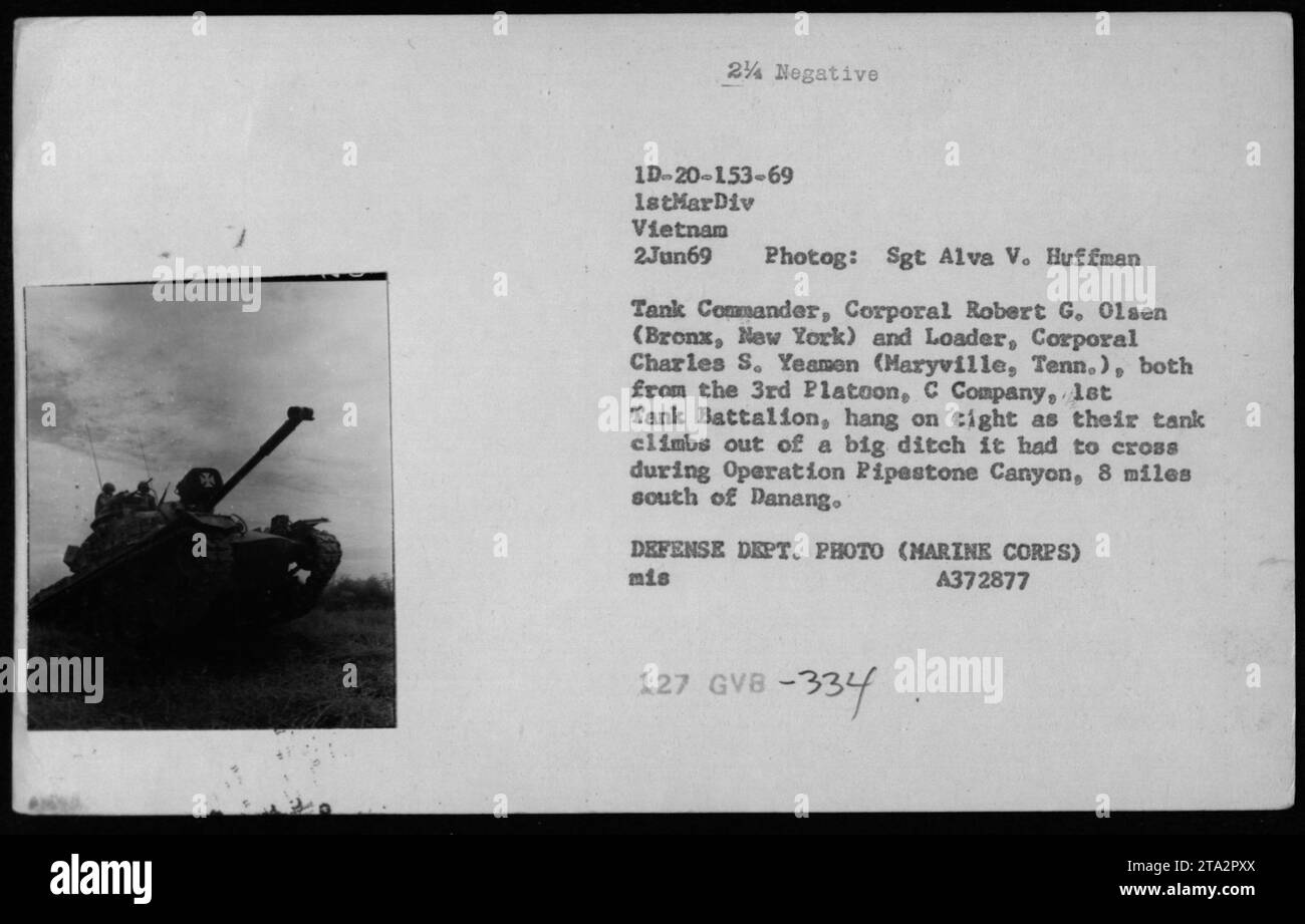 Tank crew of 3rd Platoon, C Company, 1st Tank Battalion traverses a ...