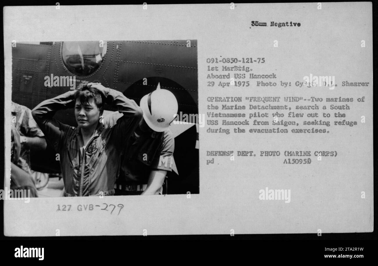"Operation Frequent Wind - Two marines search a South Vietnamese pilot ...