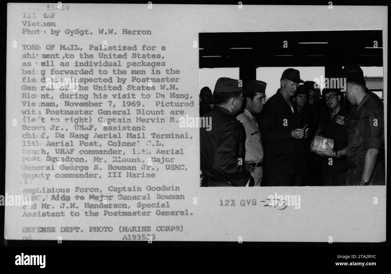 Postmaster General W.M. Blount inspecting pallets of mail destined for ...