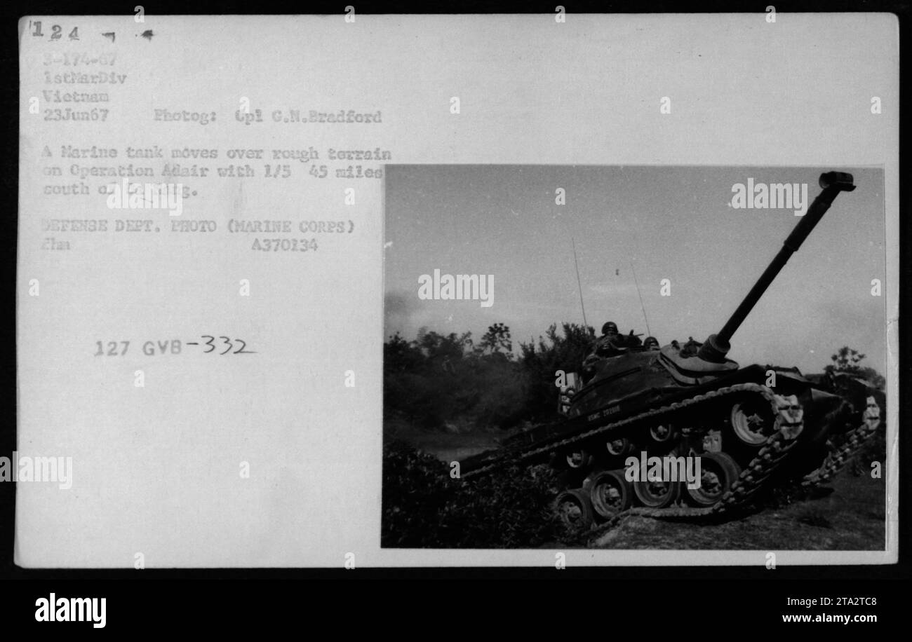 A Marine tank from 1st Battalion, 5th Marines maneuvers through ...