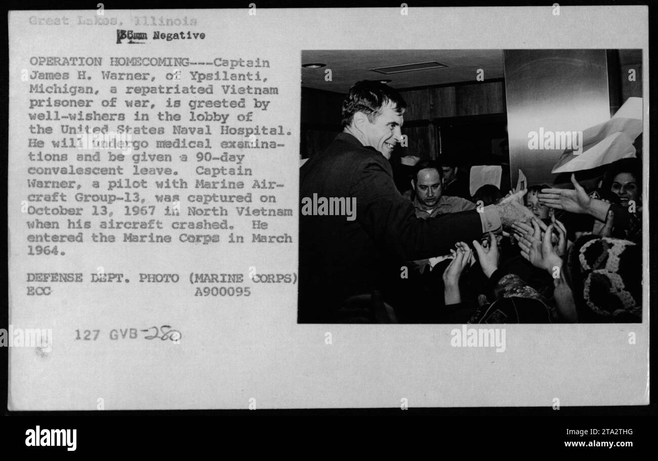 The photograph shows Captain James H. Warner, a repatriated Vietnam POW ...