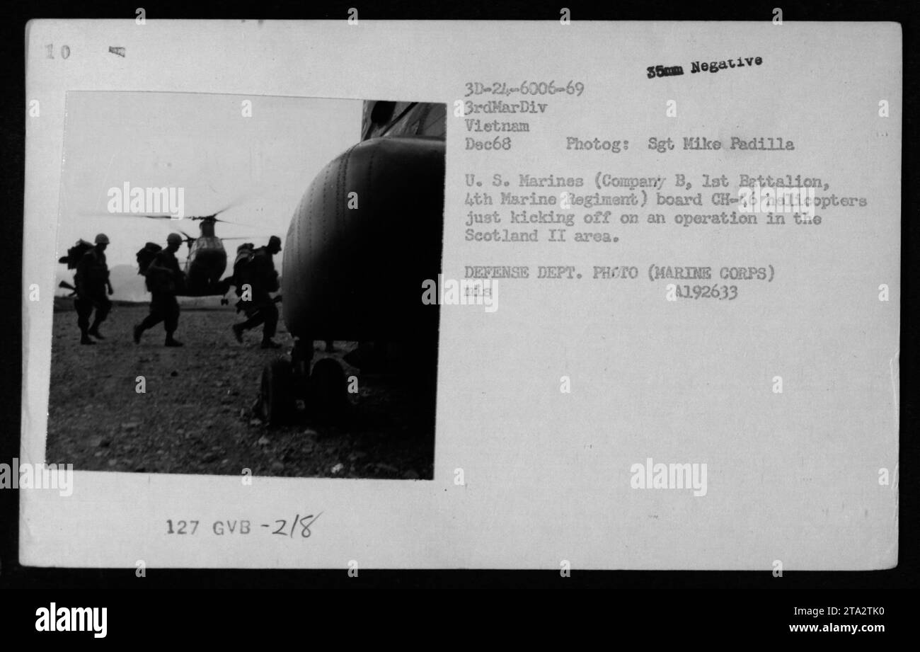 Marines from Company B, 1st Battalion, 4th Marine Regiment board CH-46 ...