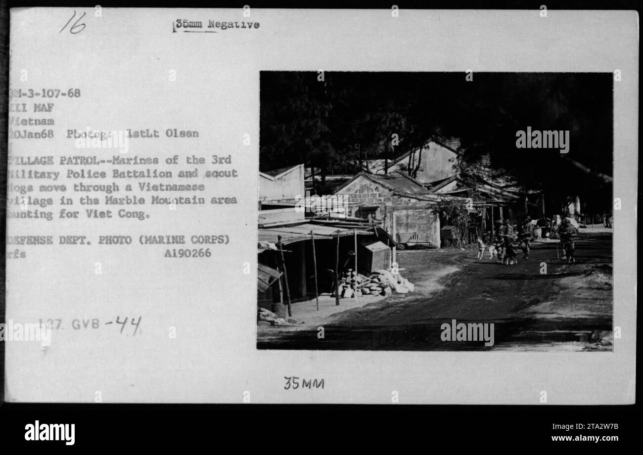 Marines from the 3rd Military Police Battalion conducting an illage ...