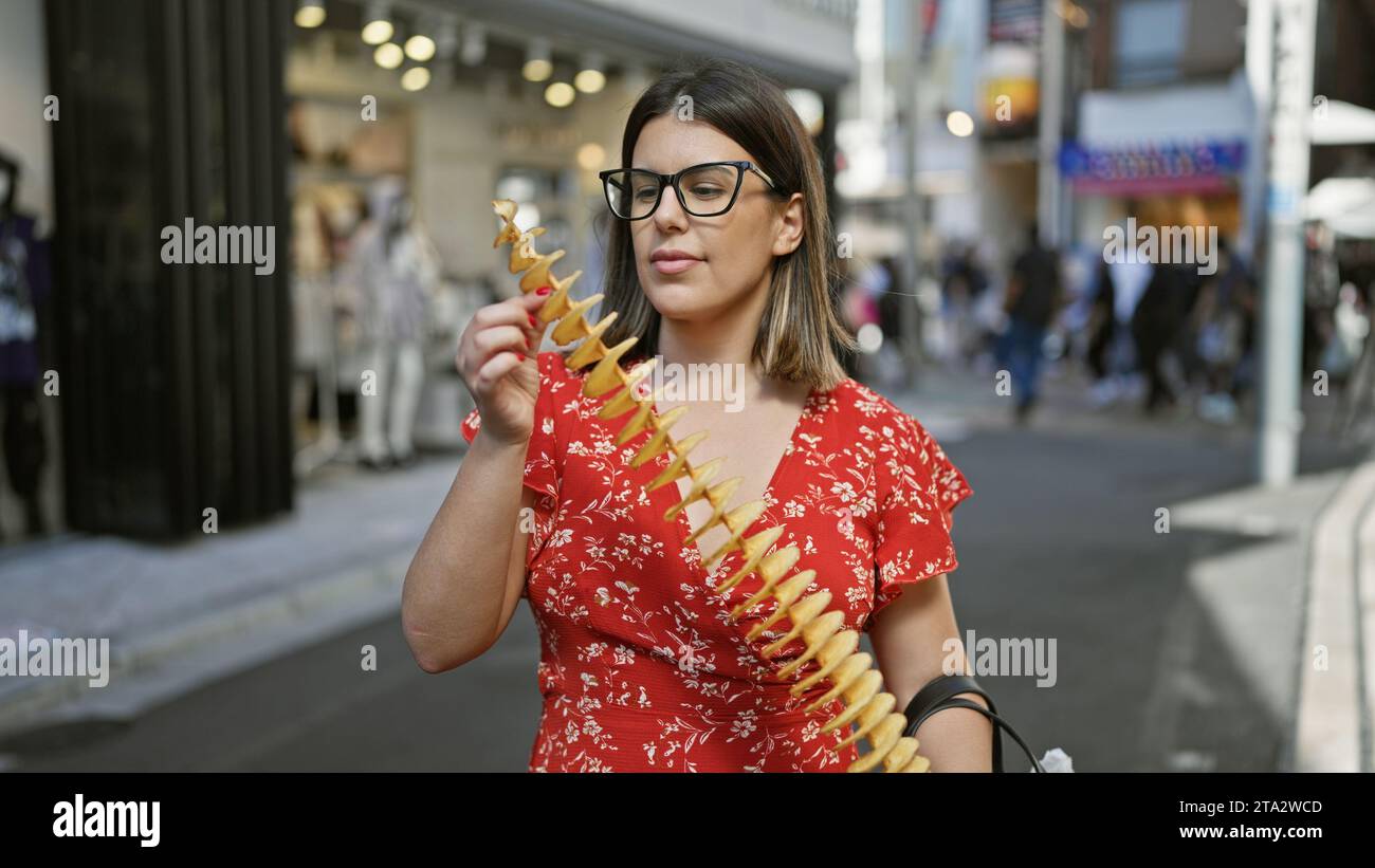 Woman eat crisps street hi-res stock photography and images - Alamy