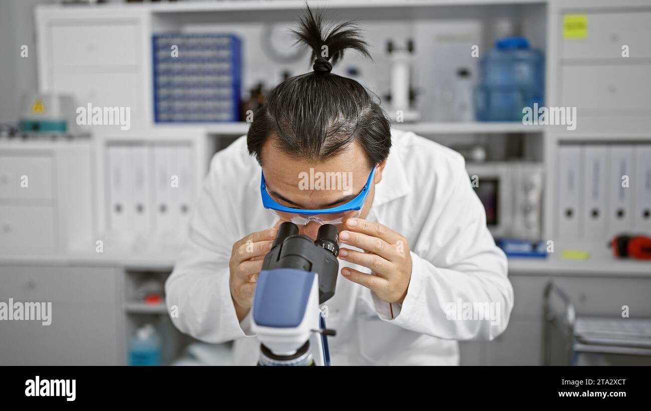 Young man deeply focused immersed hi-res stock photography and images ...