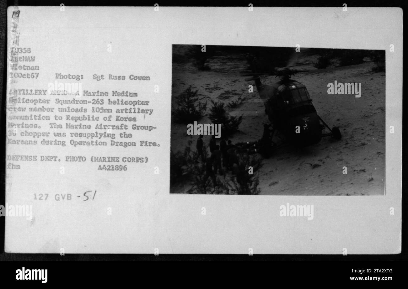 Marine Medium Helicopter Squadron-263 crew member unloads 105mm ...