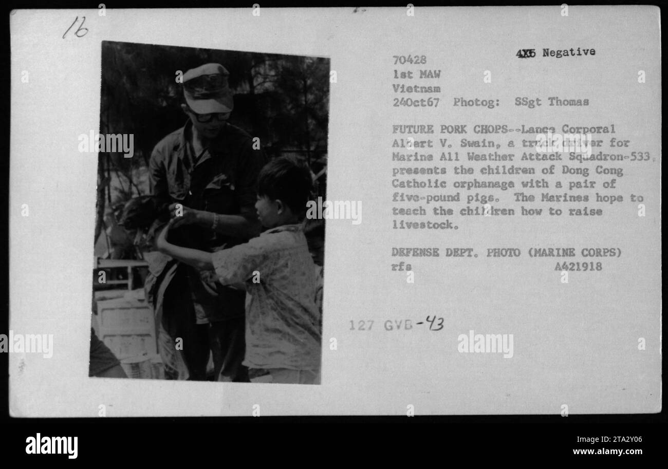 Lance Corporal Albert V. Swain, a Marine Corps truck driver, presented ...