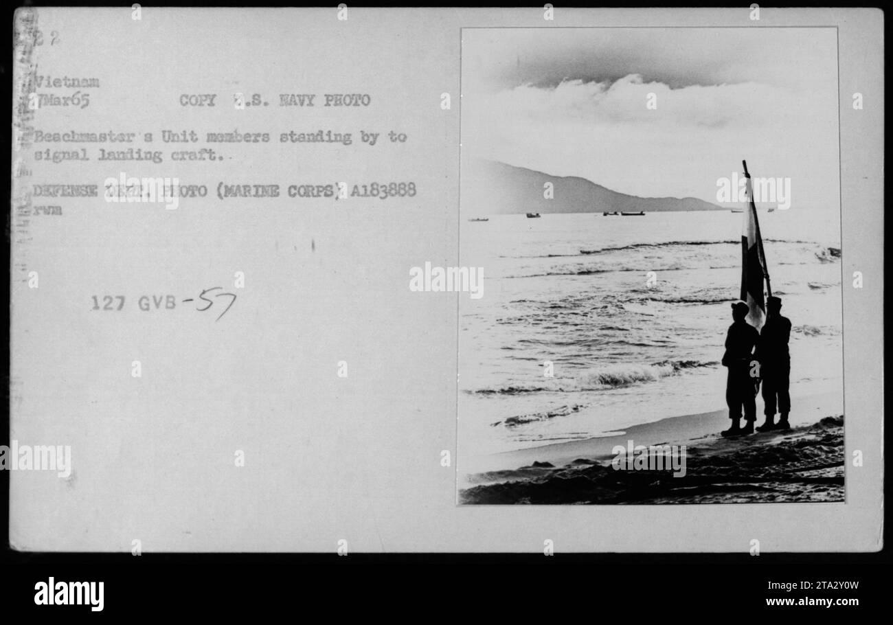 Beachmaster's Unit members of the U.S. Navy signaled landing craft on ...
