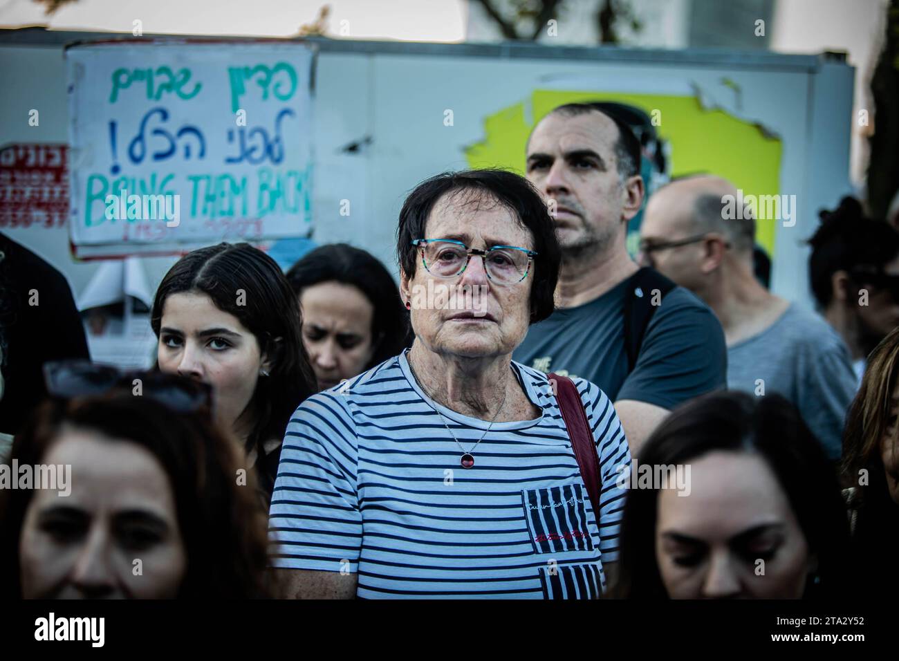 An elderly woman seen among protesters gathering during a rally calling ...