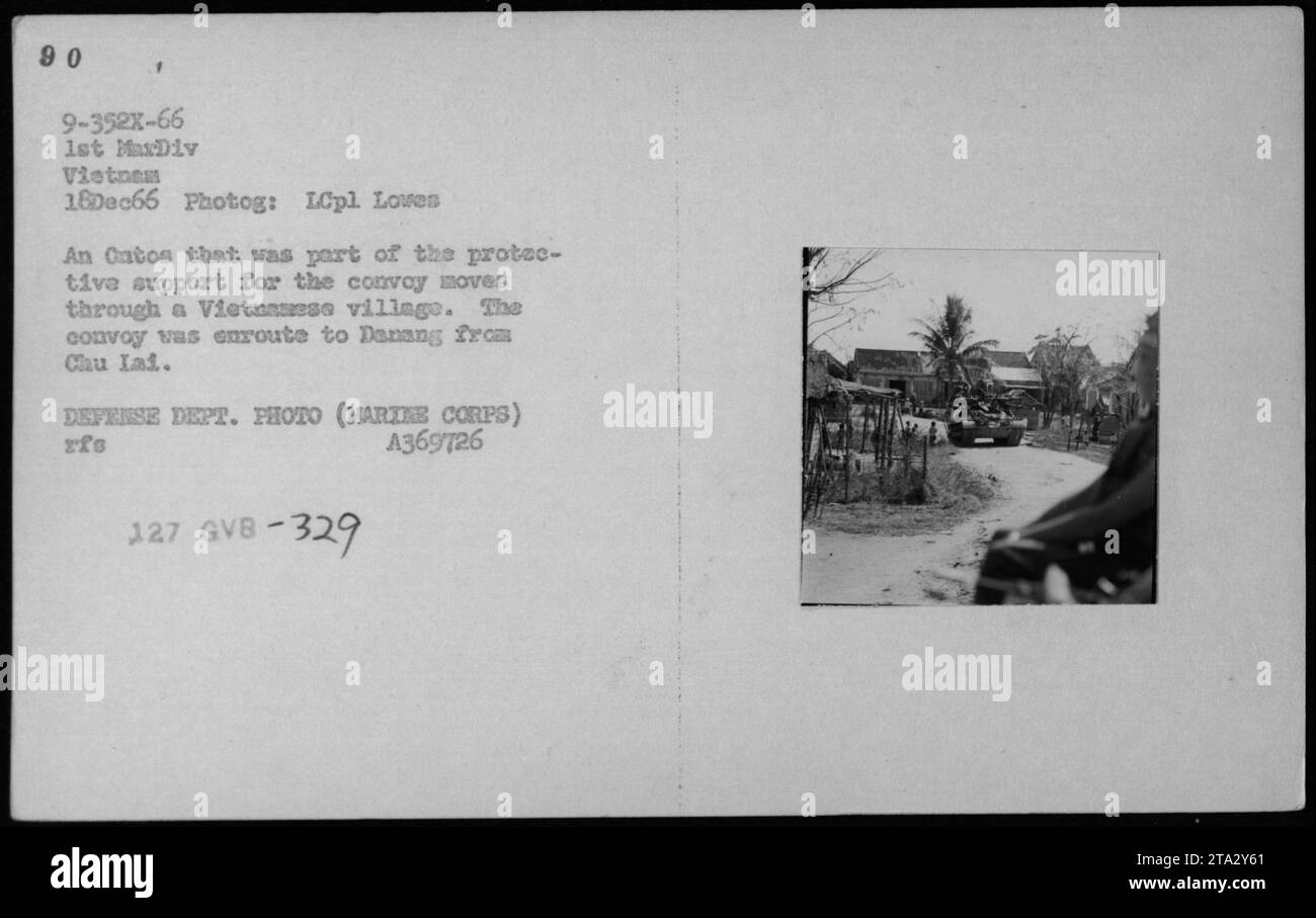 On December 18, 1966, an ONTOS tank moves through a Vietnamese village ...