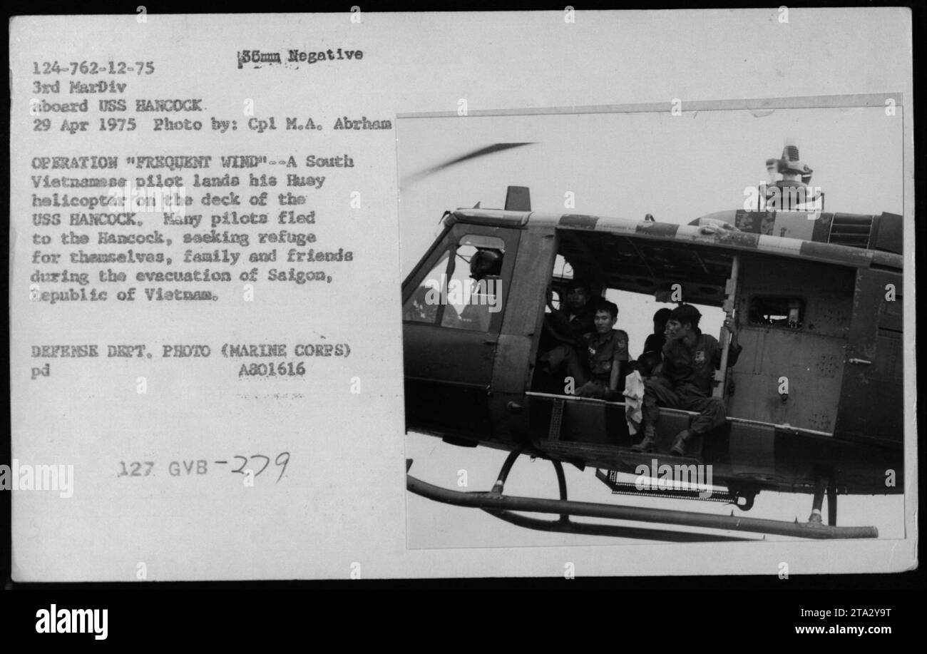 South Vietnamese pilot seeking refuge lands a helicopter on the deck of ...
